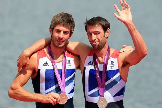 Olimpinių medalių laimėtojai 2012 m. Zacas Purchase'as ir Markas Hunteris